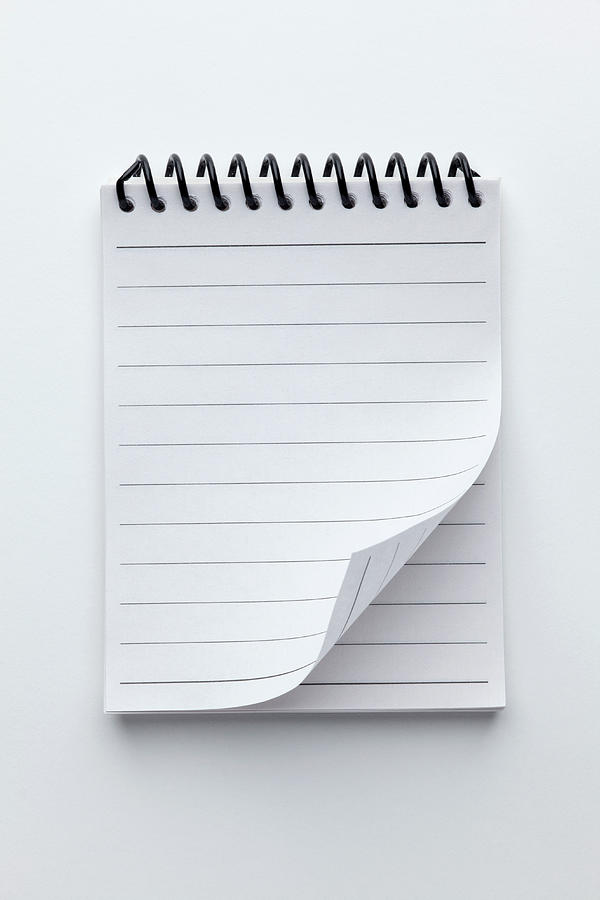 A Spiral Notepad With Lined Paper And A #1 by Caspar Benson