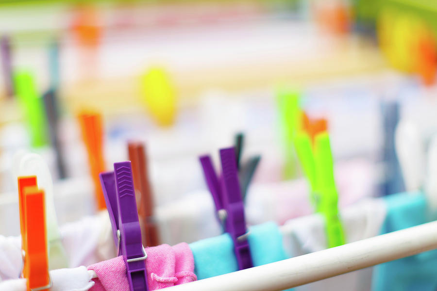 Colourful Clothes Pegs by Wladimir Bulgar / Science Photo Library