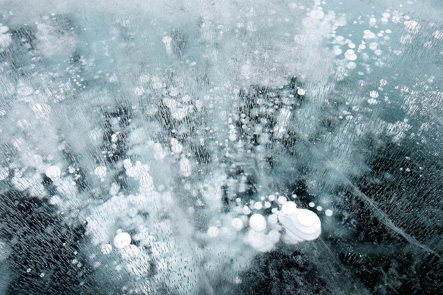 Methane Hydrate Under Ice by Louise Murray / Science Photo Library