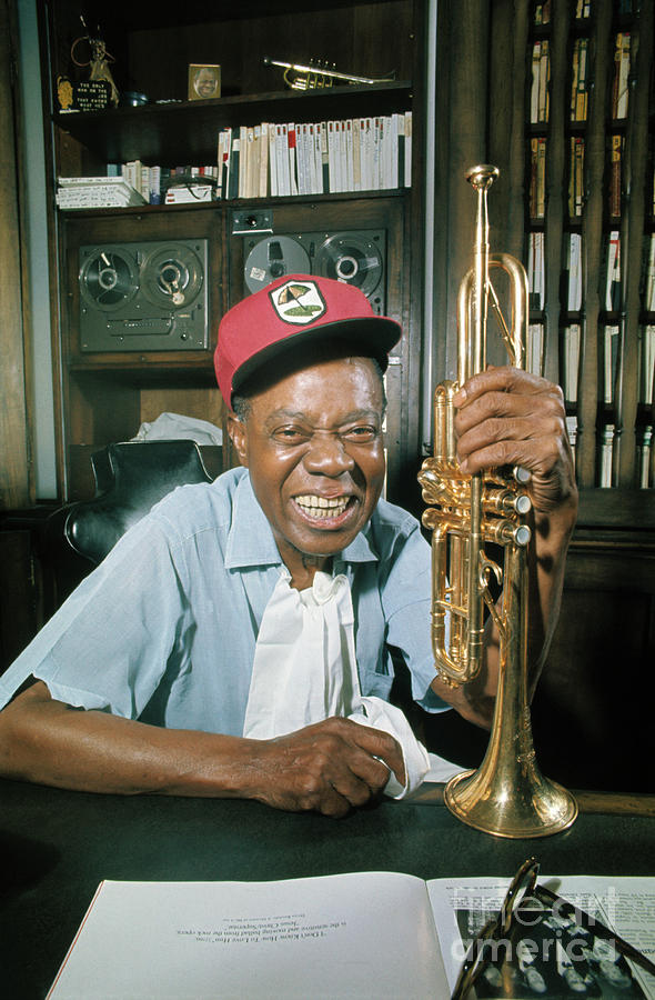 Louis Armstrong Holding Trumpet #1 by Bettmann