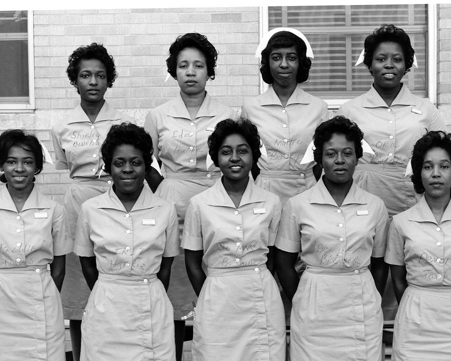 A Group Of Nine Nursing Students Posing by Prairie View A&m University