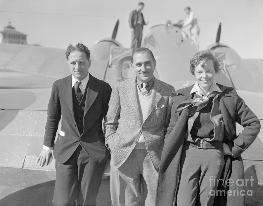 Amelia Earhart, Harry Manning, And Paul by Bettmann