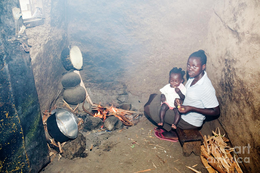 Cooking Fire by Adam Hart-Davis / Science Photo Library