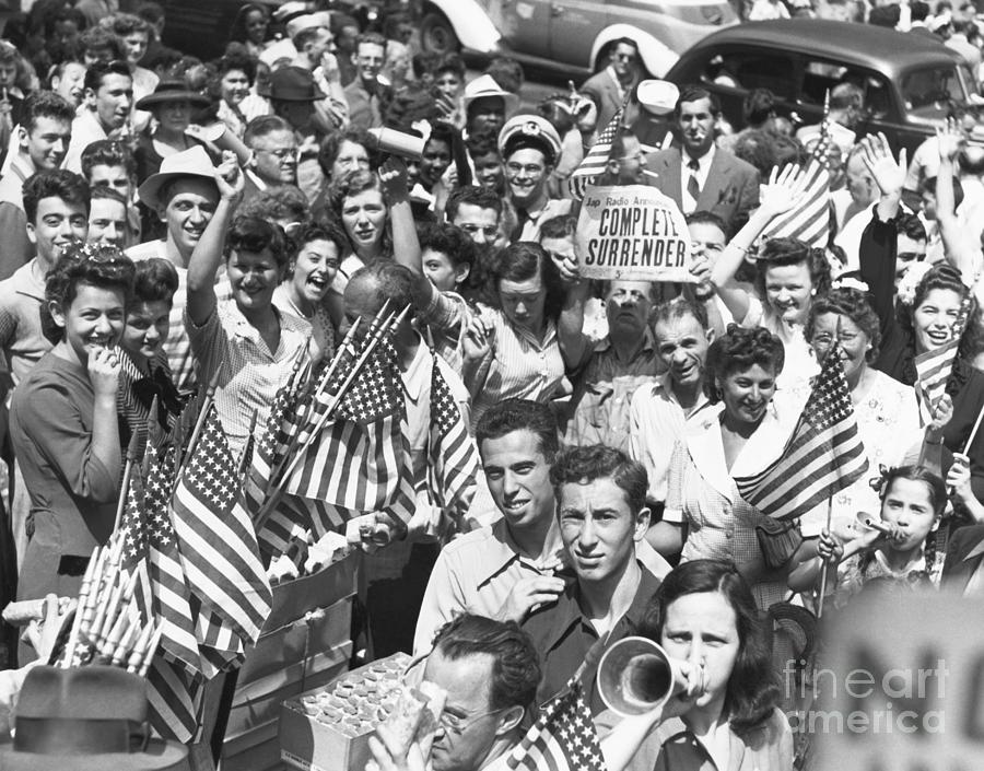Crowd Celebrating The World War II End by Bettmann