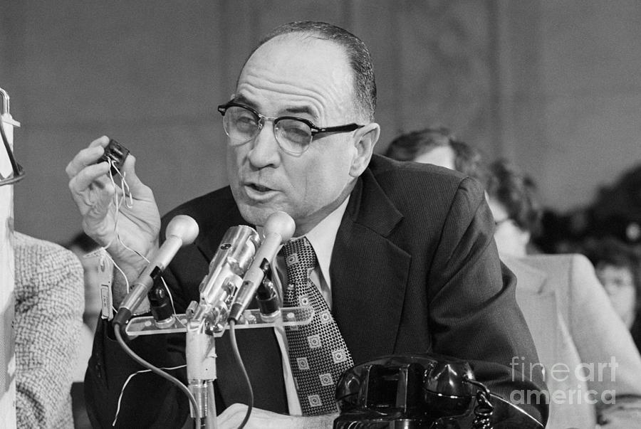 Watergate Burglar Demonstrating Bugging by Bettmann