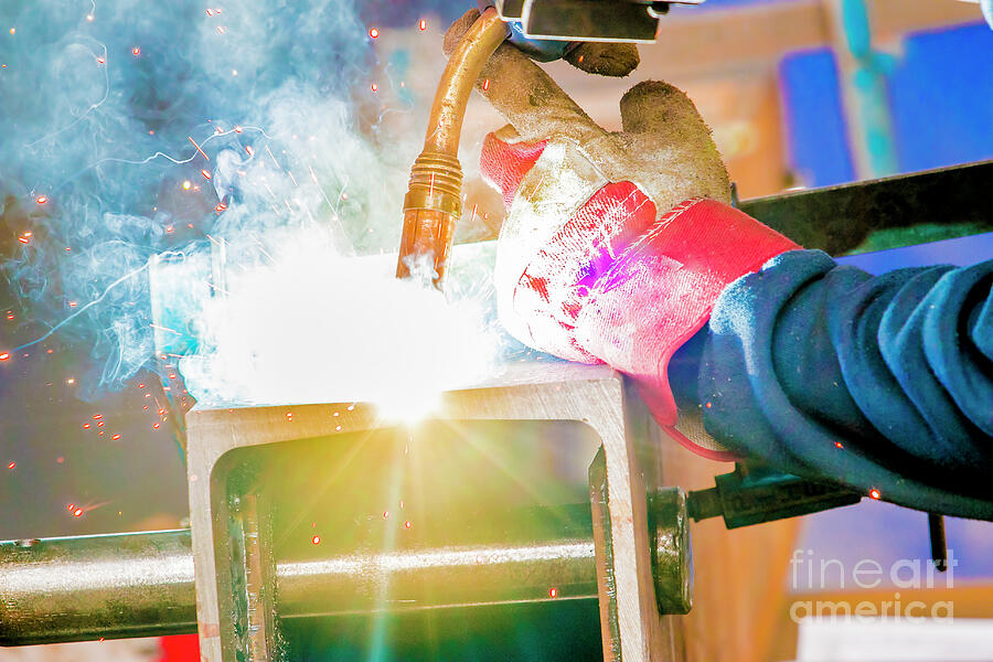 Welder Cutting Through Metal Block by Photostock-Israel / Science Photo ...