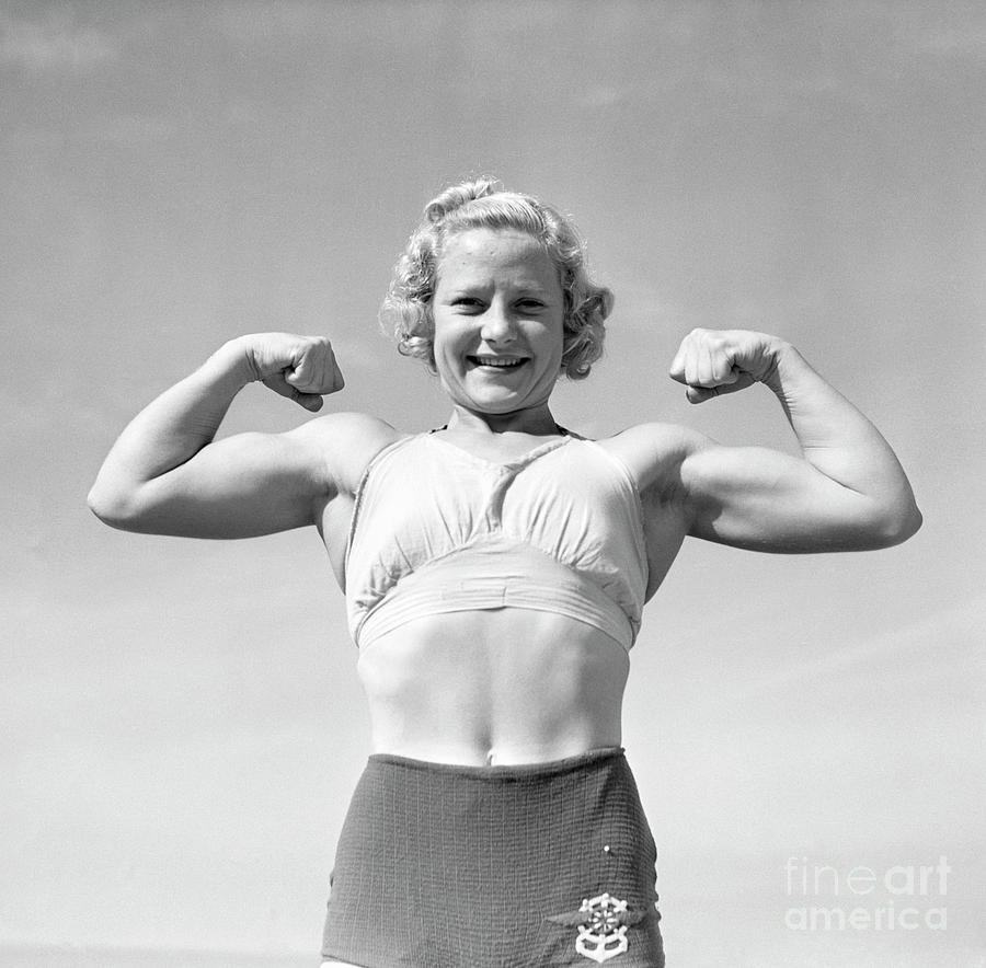 Woman Weight-lifter In Typical Pose by Bettmann
