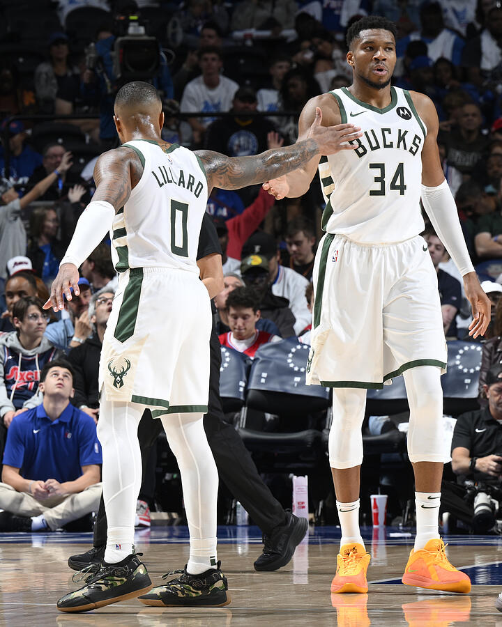 Damian Lillard and Giannis Antetokounmpo by David Dow