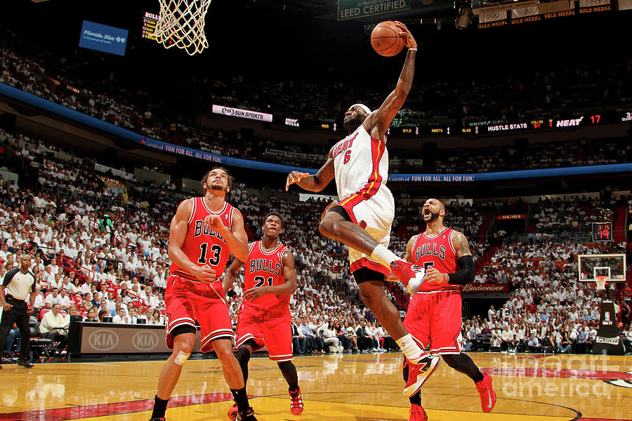 Joakim Noah and Lebron James by Issac Baldizon